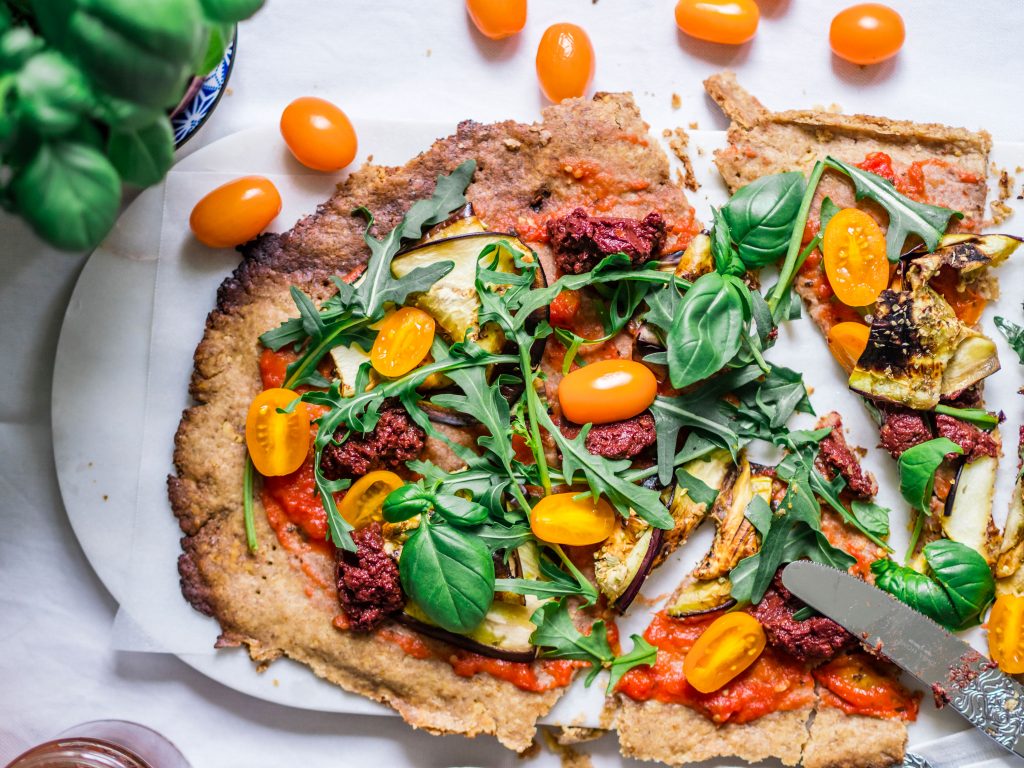 Walnut Crust Pizza with Homemade Roasted Tomato Sauce and Black Olive ...